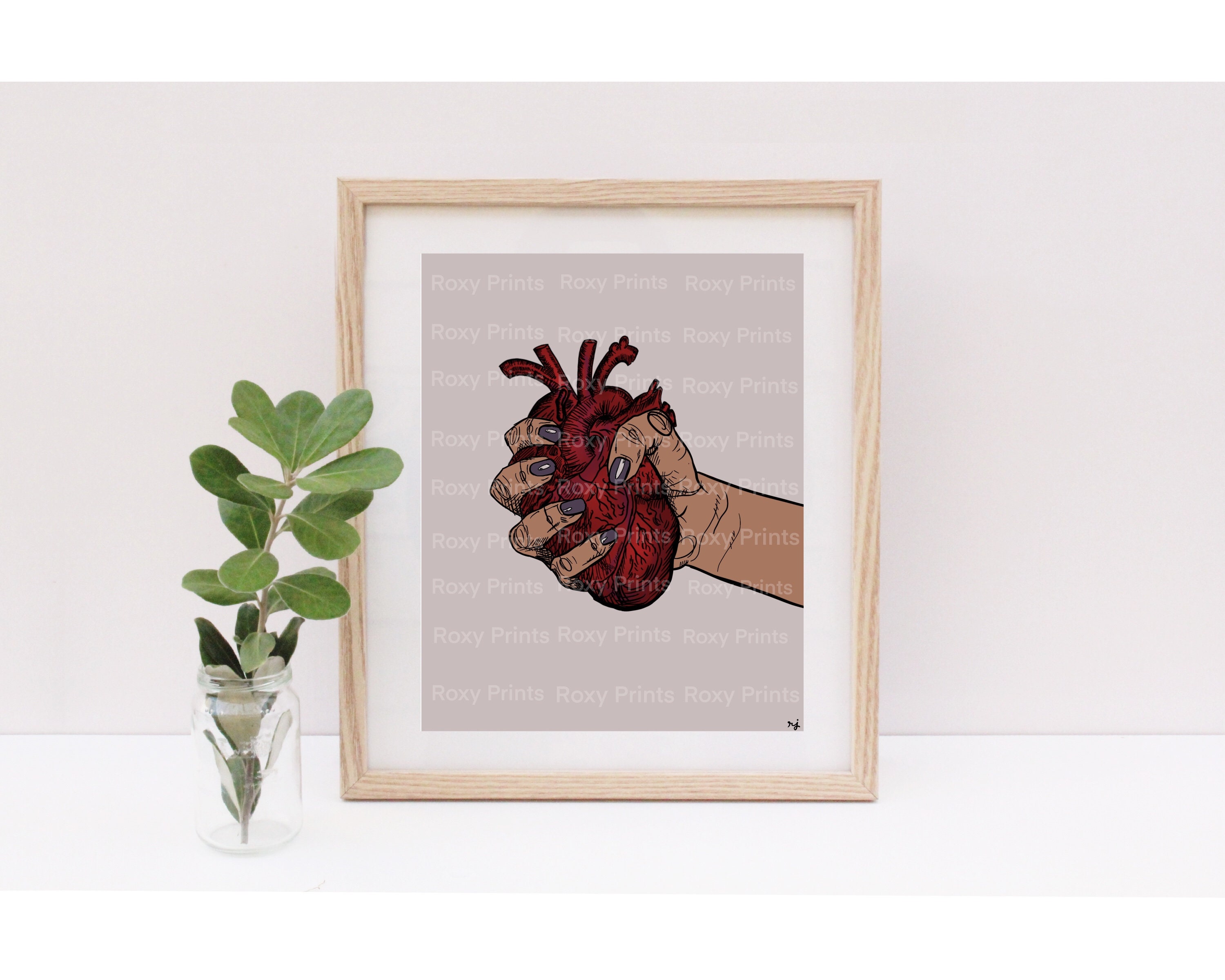 Heart In Hand Tattoo