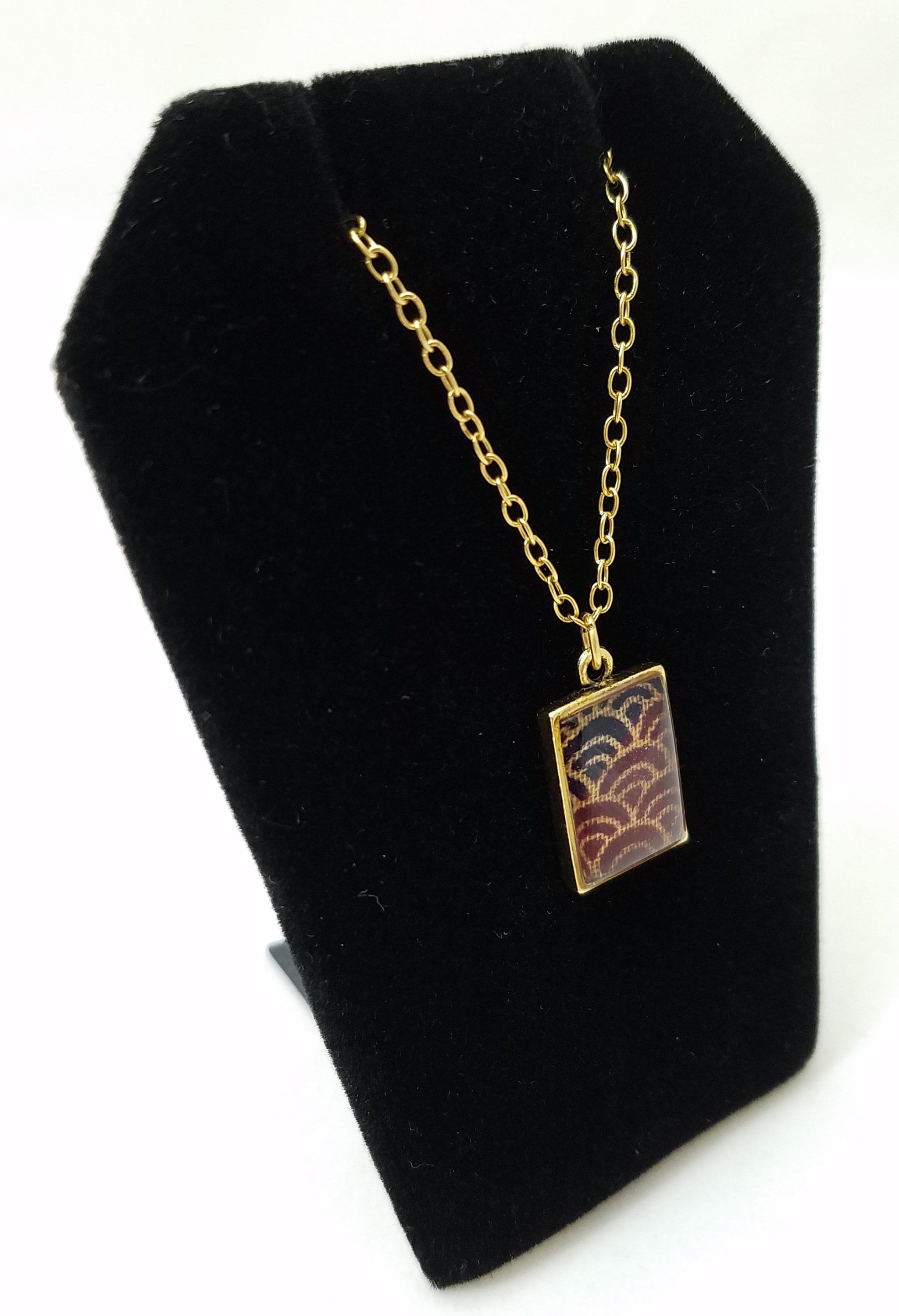 24k gold rectangle pendant necklace with deep maroon and blue wave ...