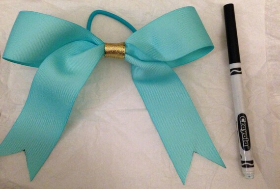 Items similar to Turquoise Cheer Bow on Etsy