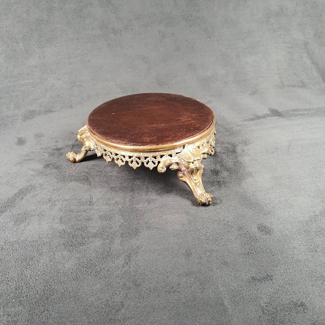 Round Mahogany Wood Base on a Chiseled Gilt Bronze Support Resting on ...
