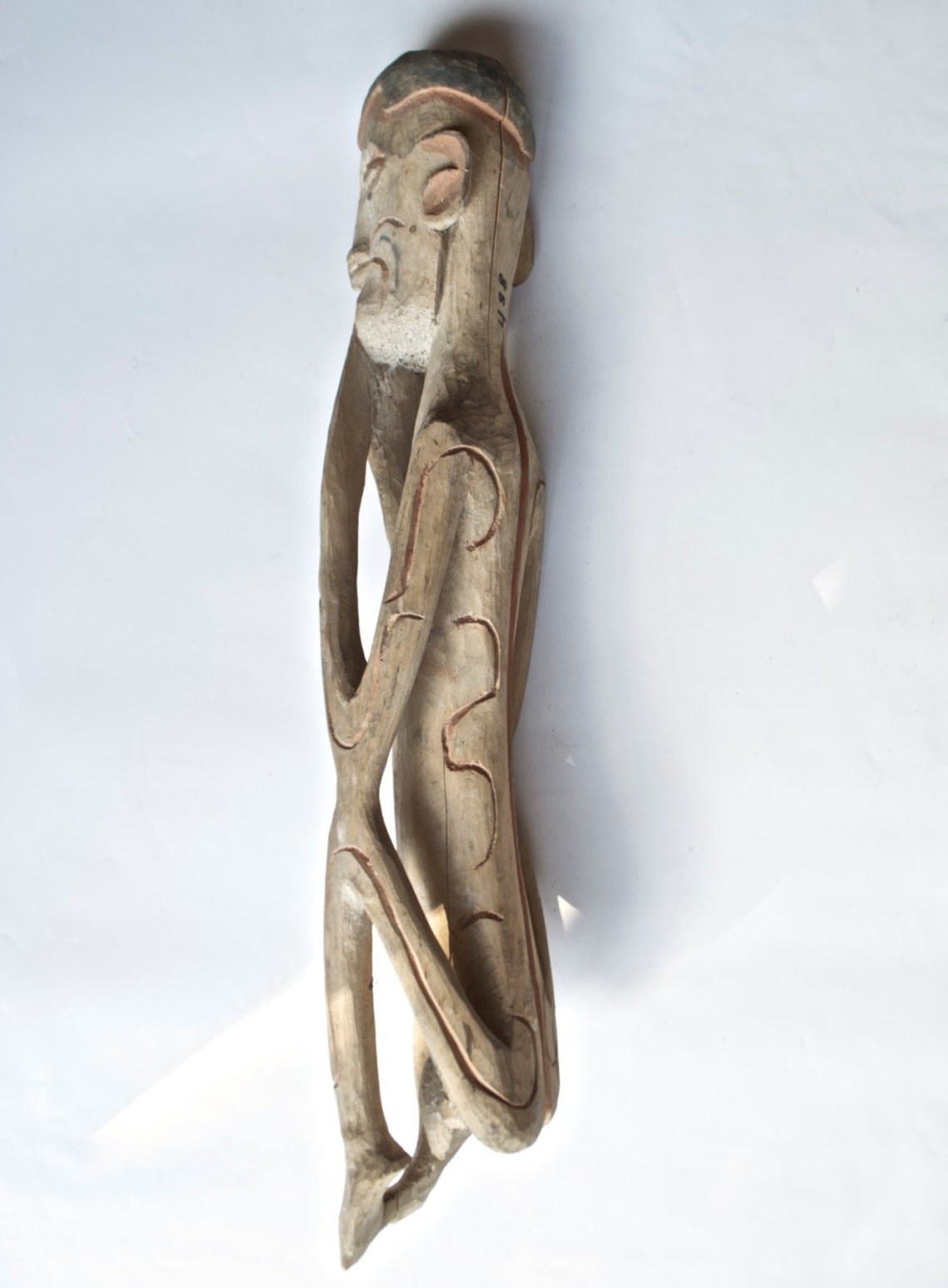 Asmat Male Figure in Squatting Position Hands Inside Mouth a Tribal ...