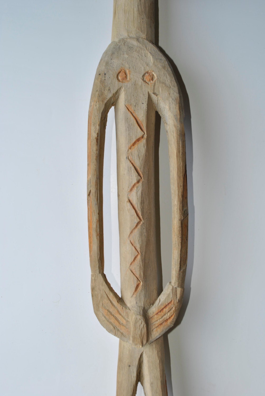 Tall Sculpture of Asmat Male Figure Standing on Head of Hornbill a ...