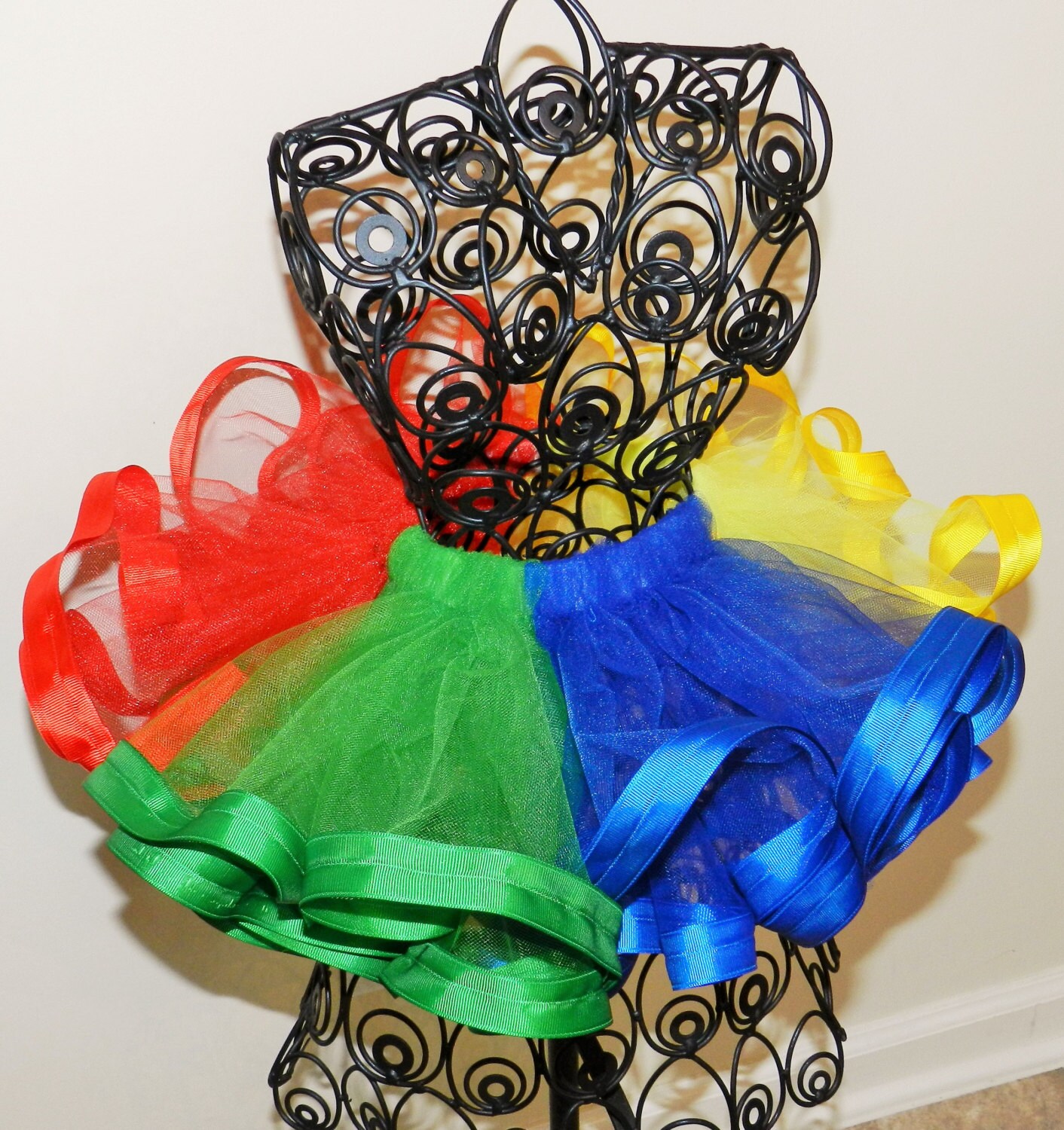 Four Colored Tutu With Ribbon Trim. Blue, Red, Green, Yellow Tutu ...