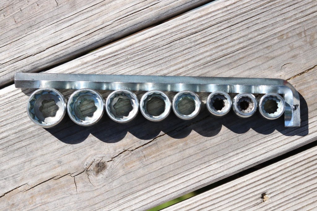 Vintage socket set with wall bracket