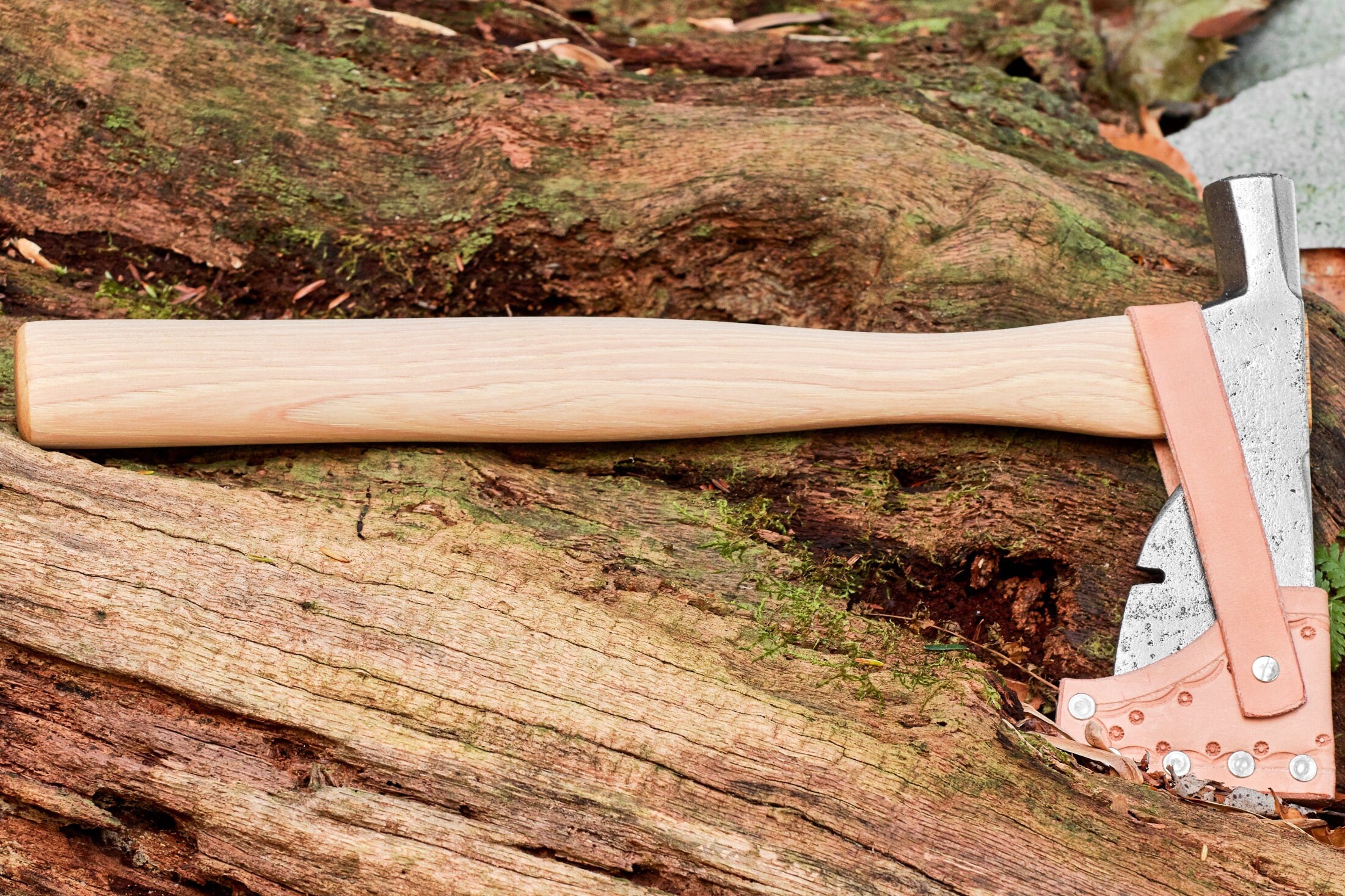 Vintage hatchet with leather sheath