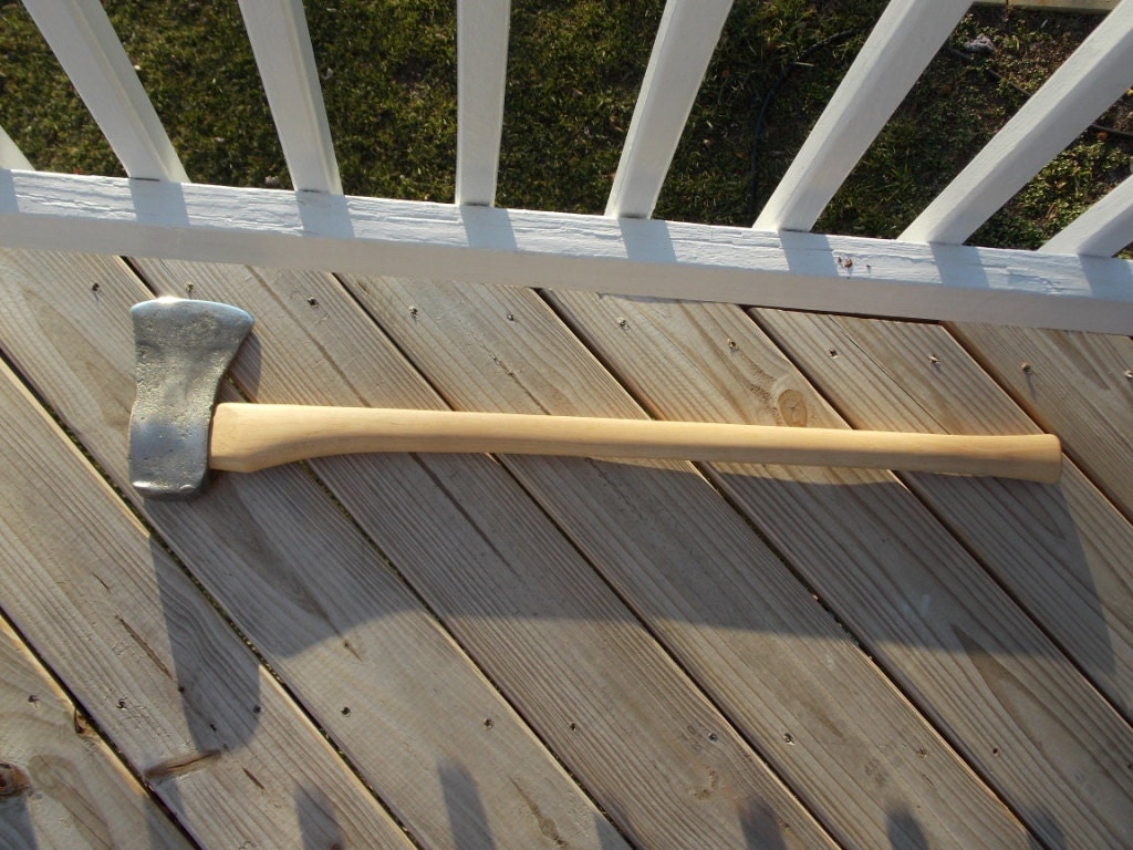 Vintage Norlund 3.5 lb axe with a 35 inch handle