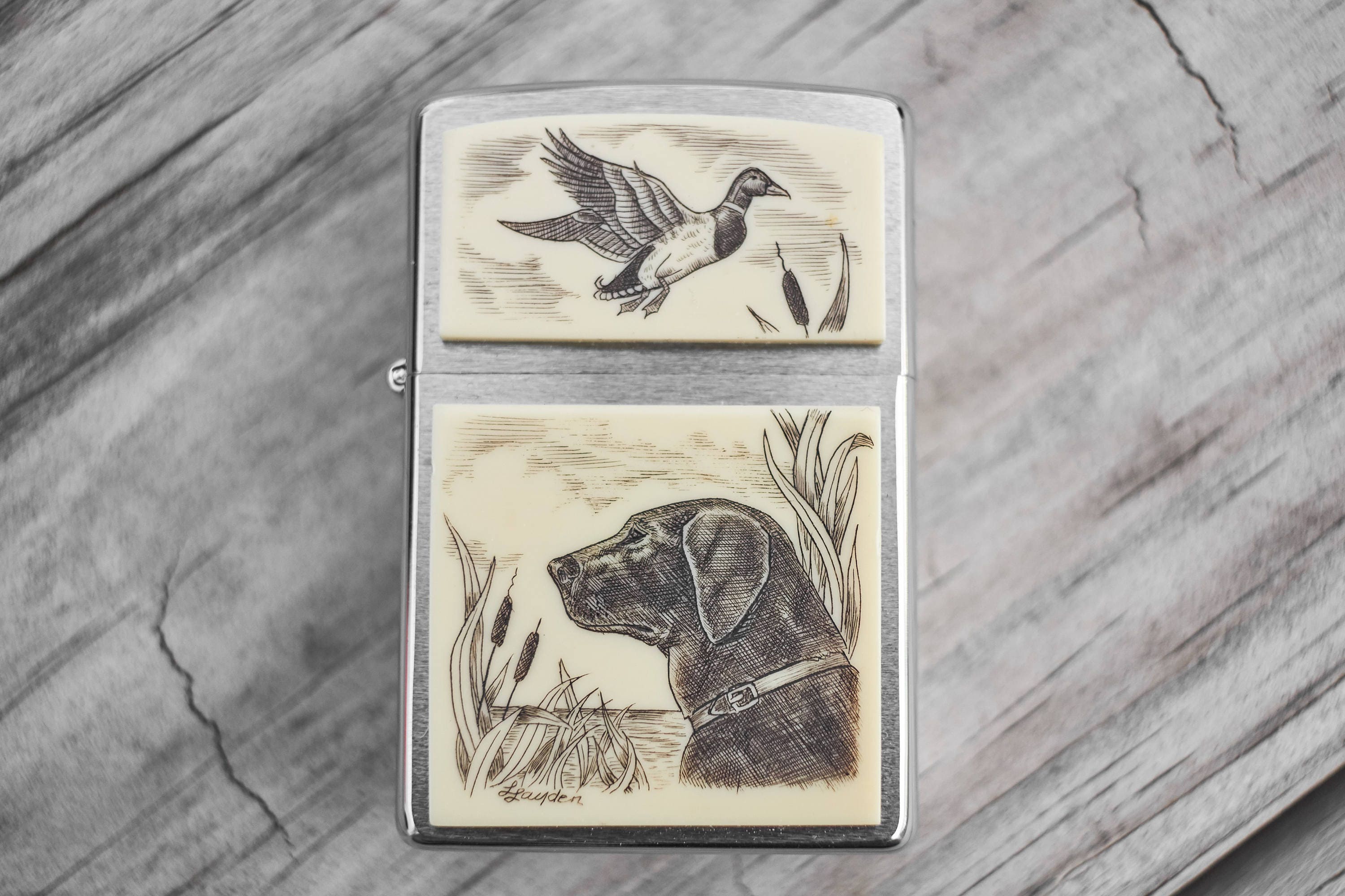 Zippo Scrimshaw Zippo with dog and duck by artist Linda Layden rare ...