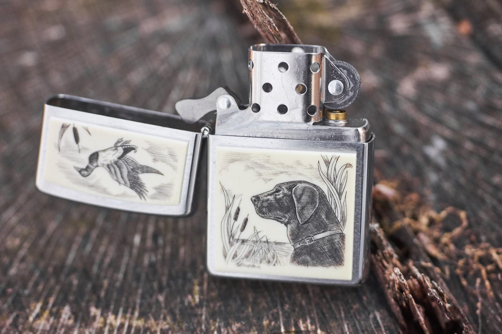Zippo Scrimshaw Zippo with dog and duck by artist Linda Layden rare ...