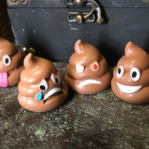 Poop emoji doll store
