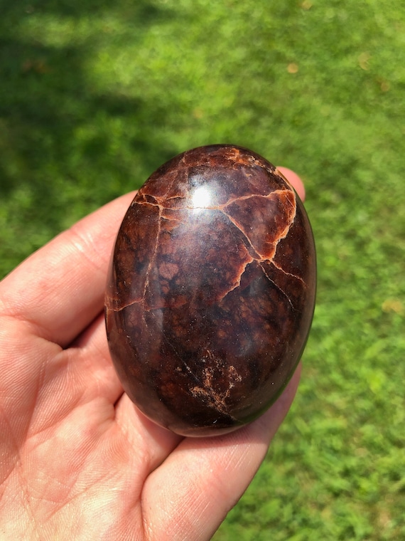 Dark red garnet palm stone from Madagascar healing and highly charged ...