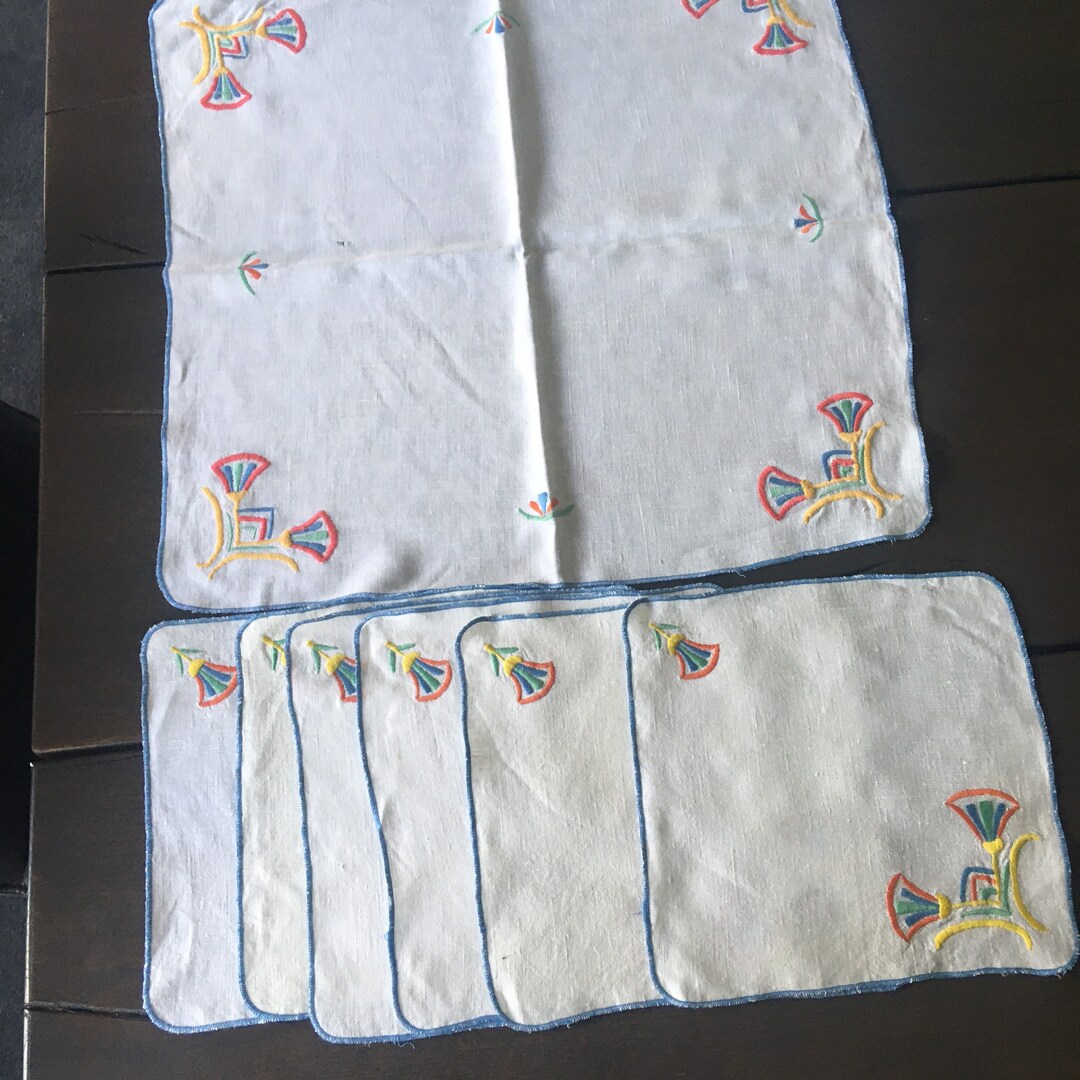 Six Small Embroidered Square Napkins and One Larger Cloth With Deco ...
