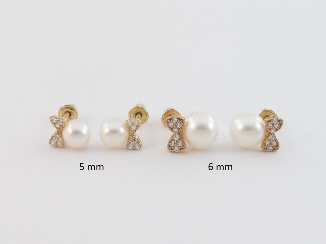 Aretes de perla estilo lazo Oro amarillo y blanco de 14 k Rosca hacia ...