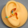 Gold Rainbow Clicker 1.2mm (16ga) Suitable for Septum, Daith, Rook, Conch, Helix, Cartilage 16g ...