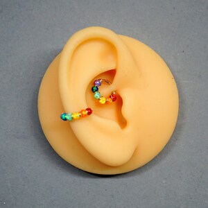 Gold Rainbow Clicker 1.2mm (16ga) Suitable for Septum, Daith, Rook, Conch, Helix, Cartilage 16g ...