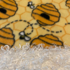 Honey Bee Print Fleece With White Furry Fleece Trim and 3 Inch Pom Pom ...