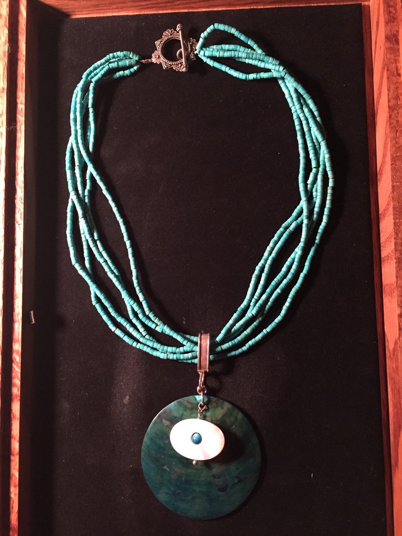 Evil Eye Amulate in Turquoise, Silver, and Shells - Etsy
