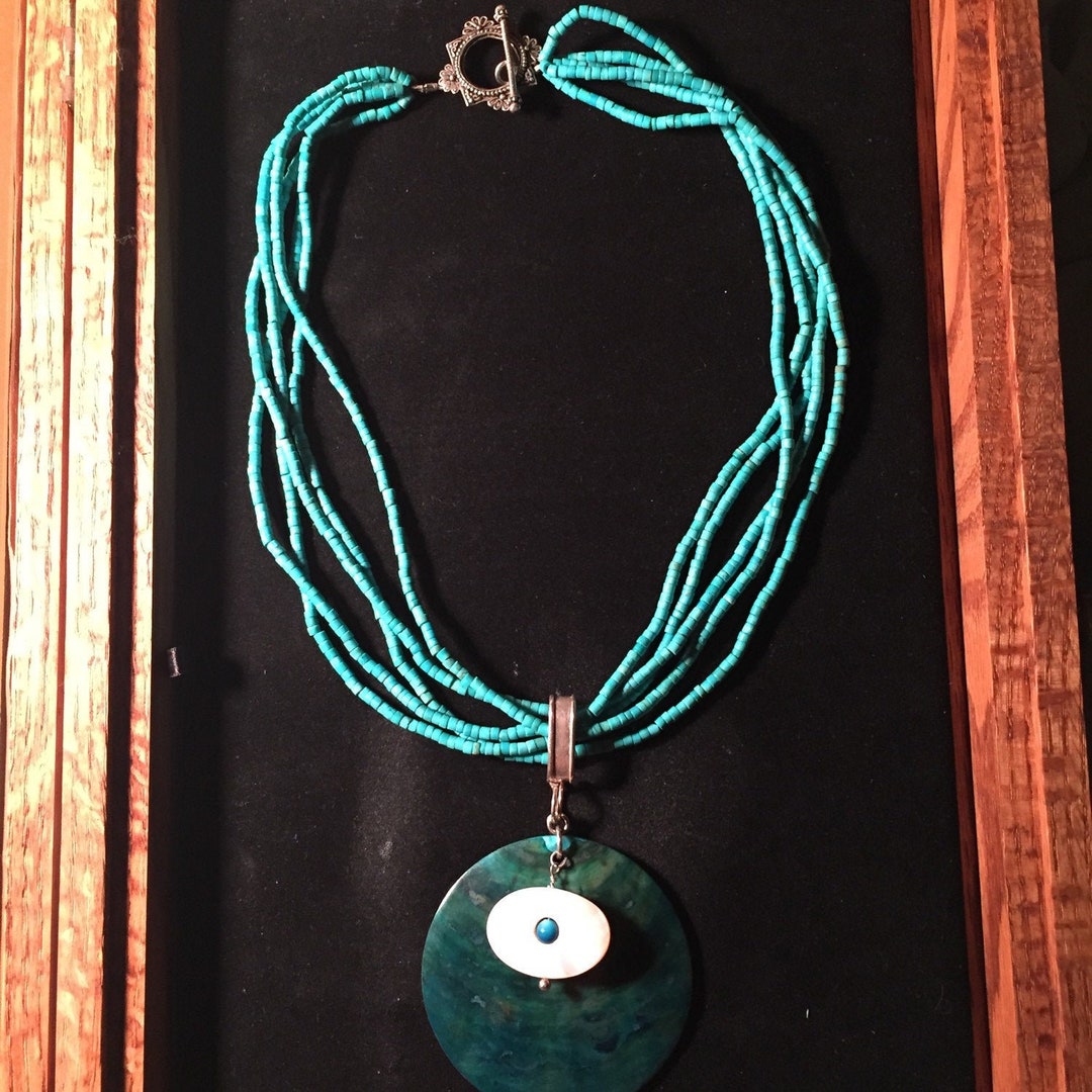 Evil Eye Amulate in Turquoise, Silver, and Shells - Etsy
