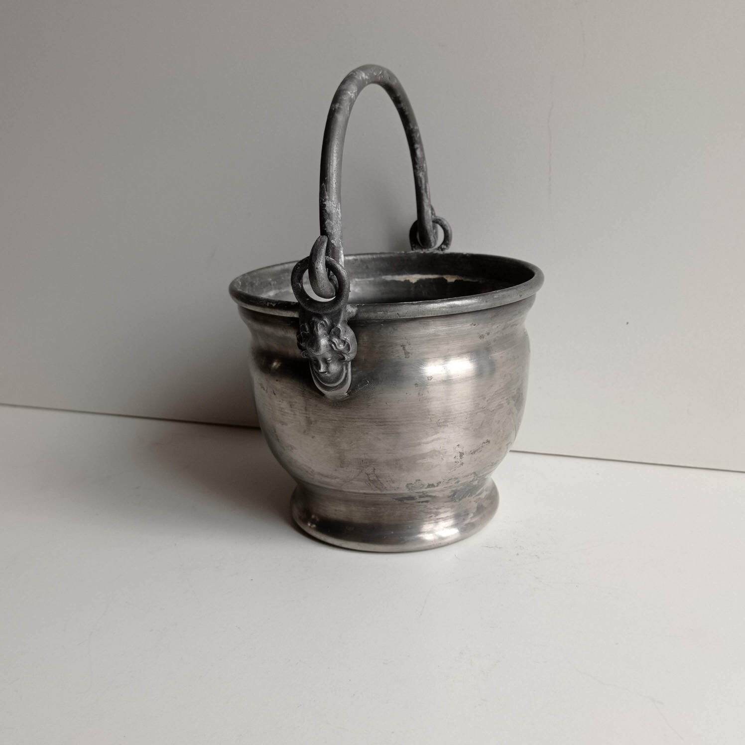 with handle and bust images at both sides. cauldron French antique ...