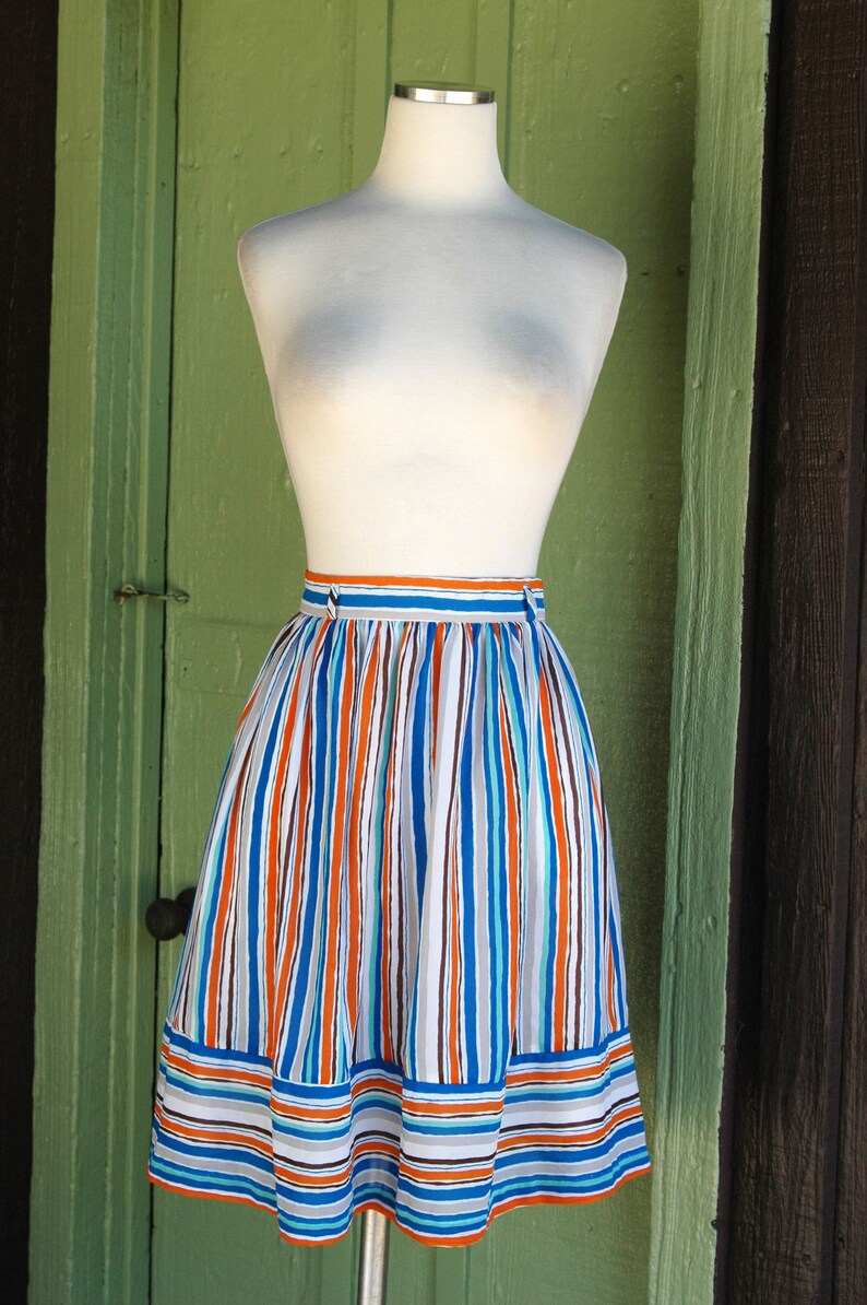 1970s Blue Orange White Green Brown Striped Campus Casual Striped Skirt ...