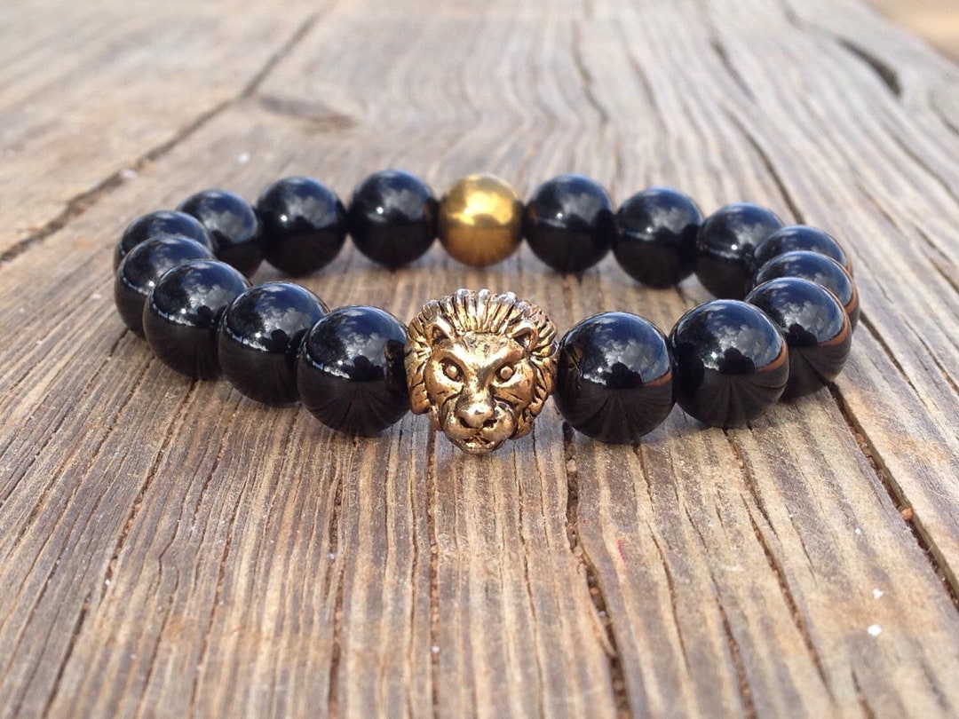 Onice nero e oro Hematite Healing Crystal Mala Bracciale con charm ...