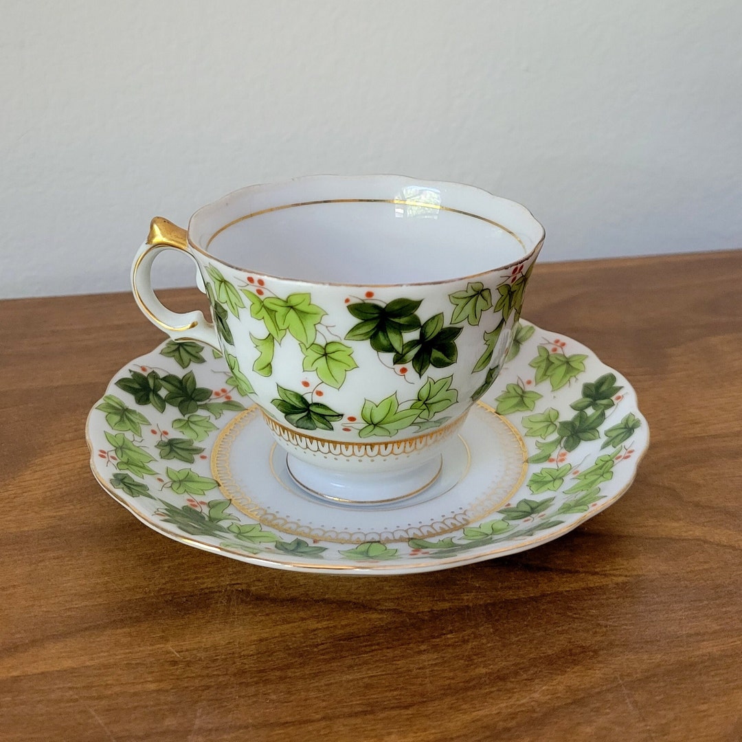 Kasuga Ware Tea Cup and Saucer Green Leaves, Red Berries and Gold Trim ...