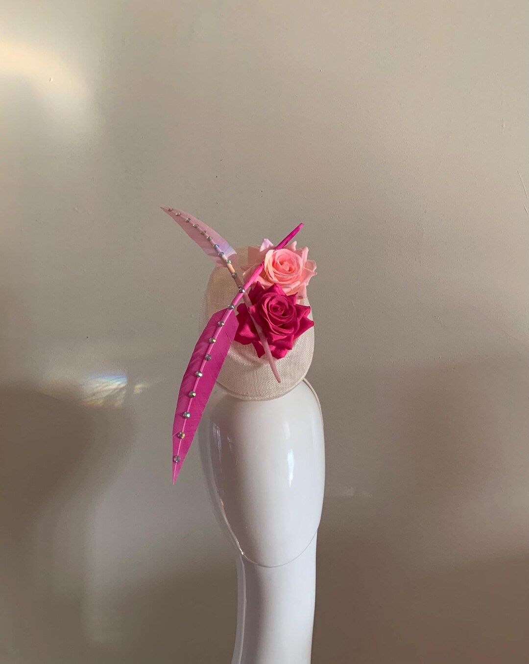 Ivory Perching Pod Hat Adorned With a Brace of Dramatic Floating Pink ...