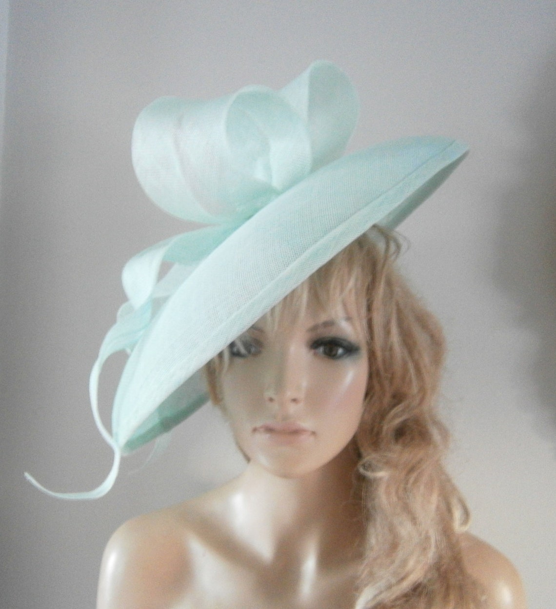 Aqua Saucer With Down Turned Brim Embellished With a Sculptured ...