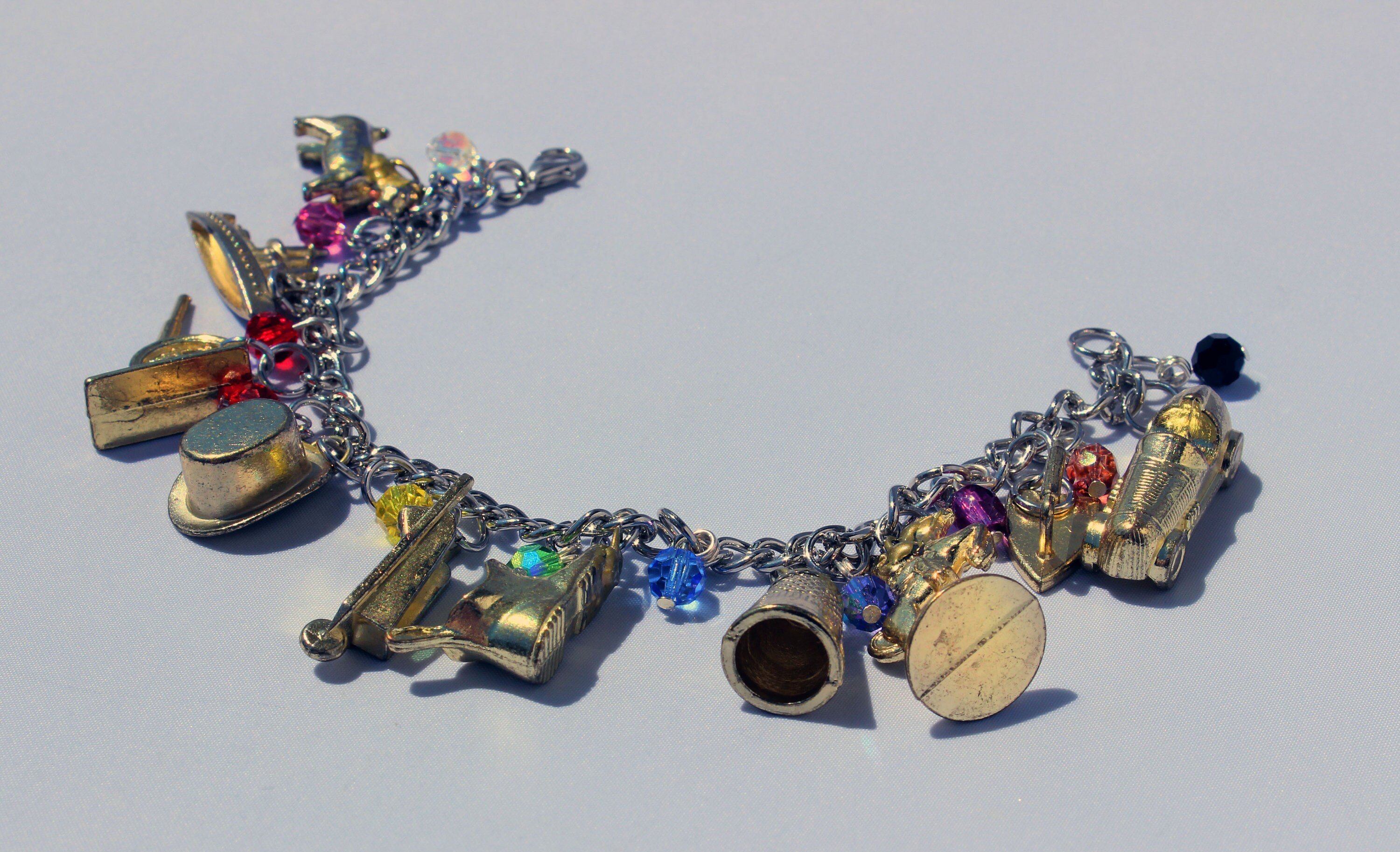 Gold Monopoly Token Charm Bracelet with Rainbow Beads | Etsy