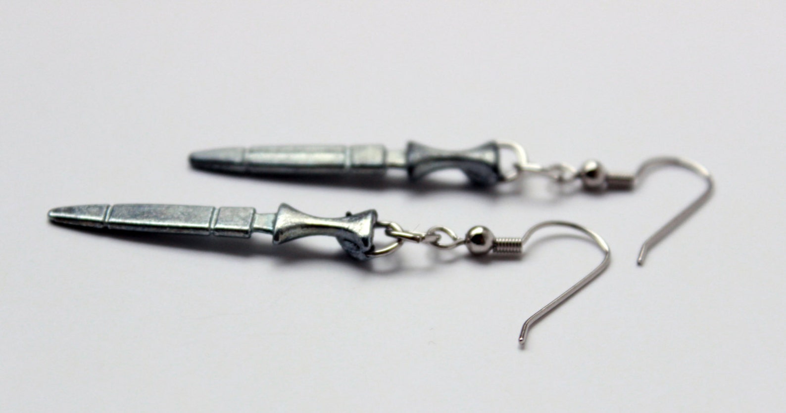 Clue Dagger Token Earrings - Etsy