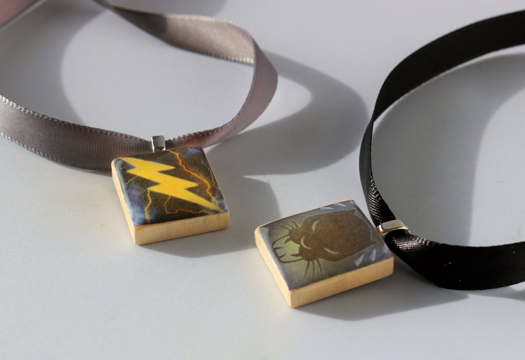 Black Panther and Storm Scrabble Tile Ribbon Chokers - Marvel Comics ...