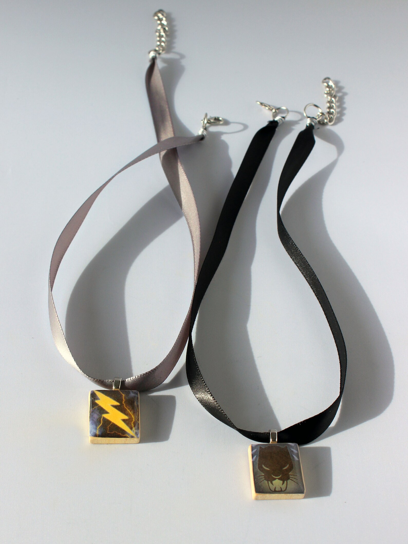 Black Panther and Storm Scrabble Tile Ribbon Chokers - Marvel Comics ...