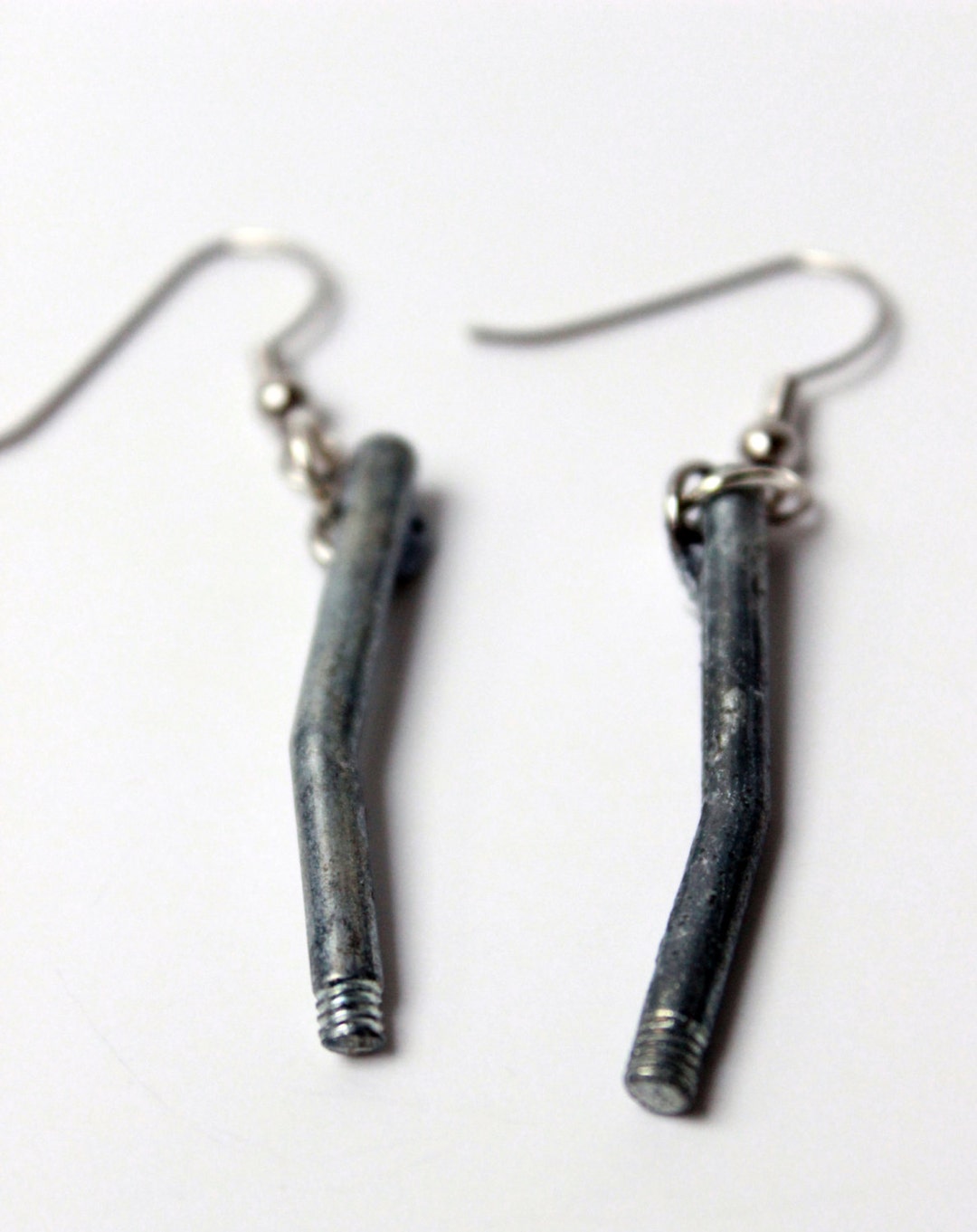 Clue Pipe Token Earrings - Etsy
