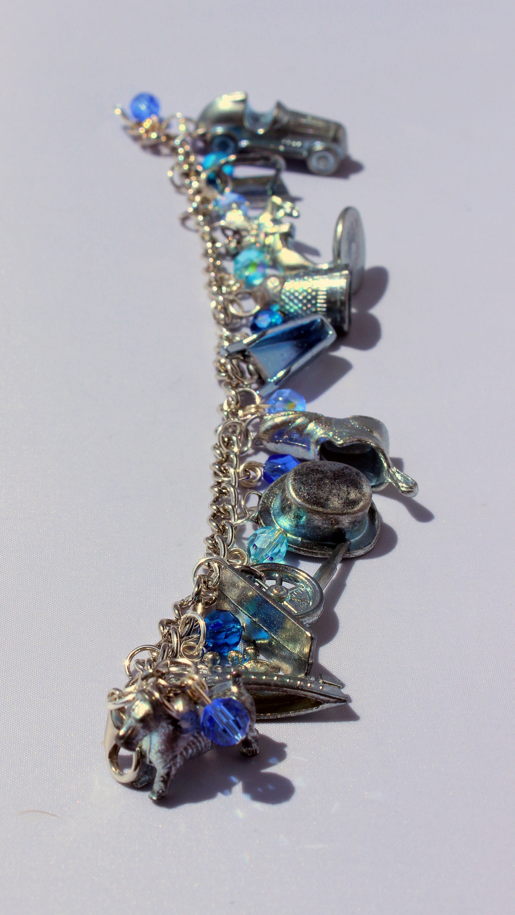 Monopoly Token Charm Bracelet with Ice Blue Beads | Etsy