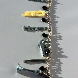 Clue Token Charm Bracelet With Black Heart-shaped Beads - Etsy