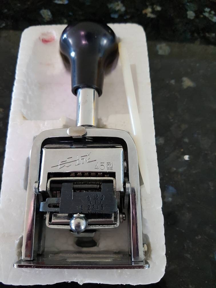 Vintage great wall numbering machine | Etsy
