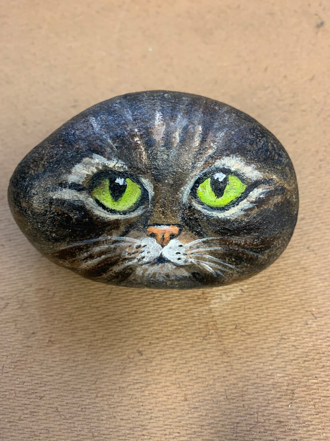 Small Brown Cat Face Rock Painting in Acrylic. It is Covered With Water ...