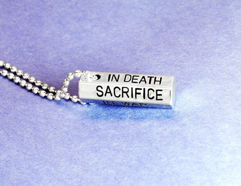 Aluminum Hexagon Necklace: "in War, Victory. in Peace, Vigilance. in ...