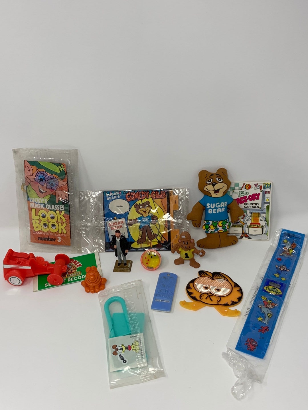 Vintage Cereal Premium Prize Lot - Garfield King Vitamin Racer Trix ...