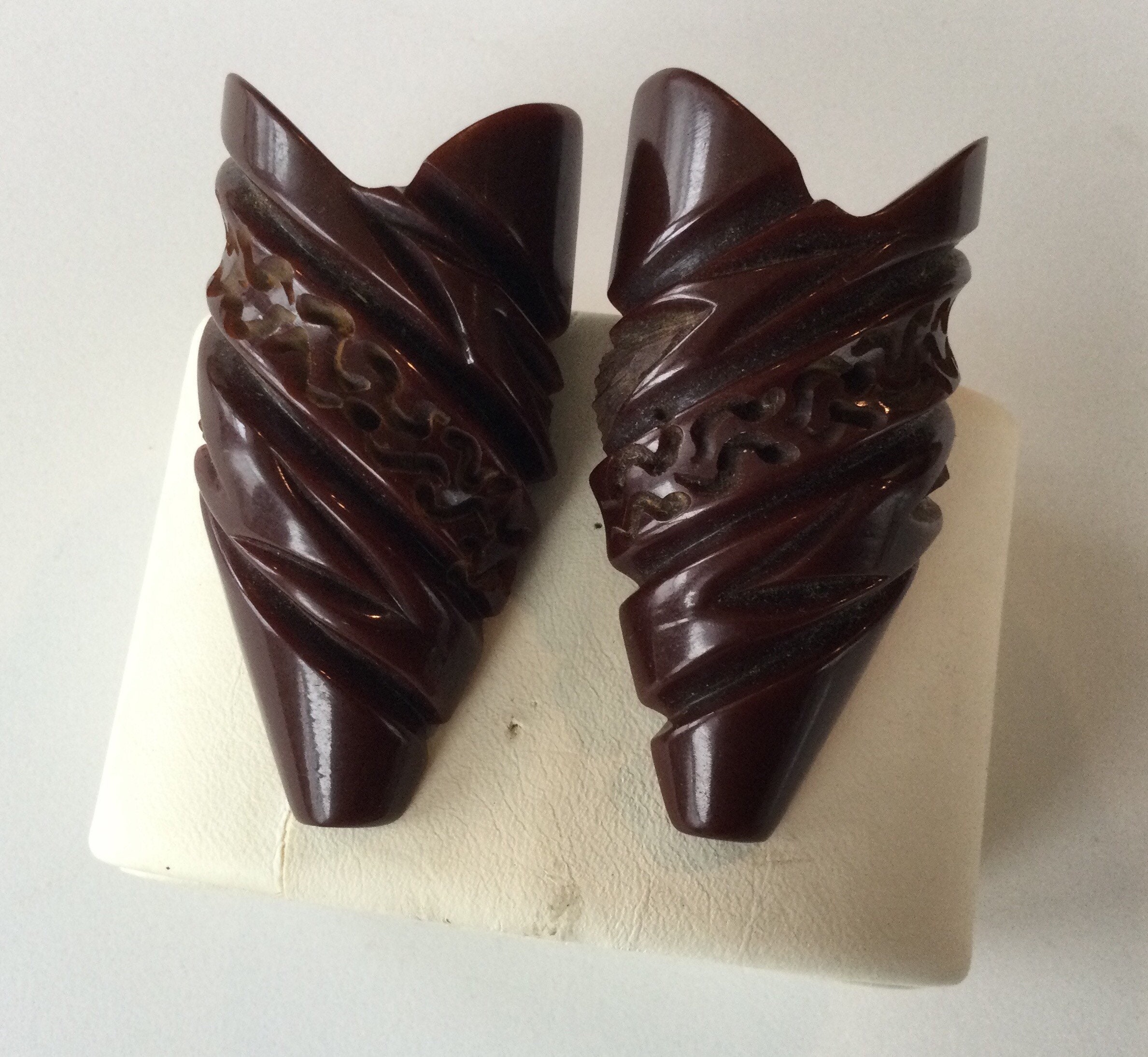 Vintage Bakelite Chocolate Dress Clips Featuring Carved Design