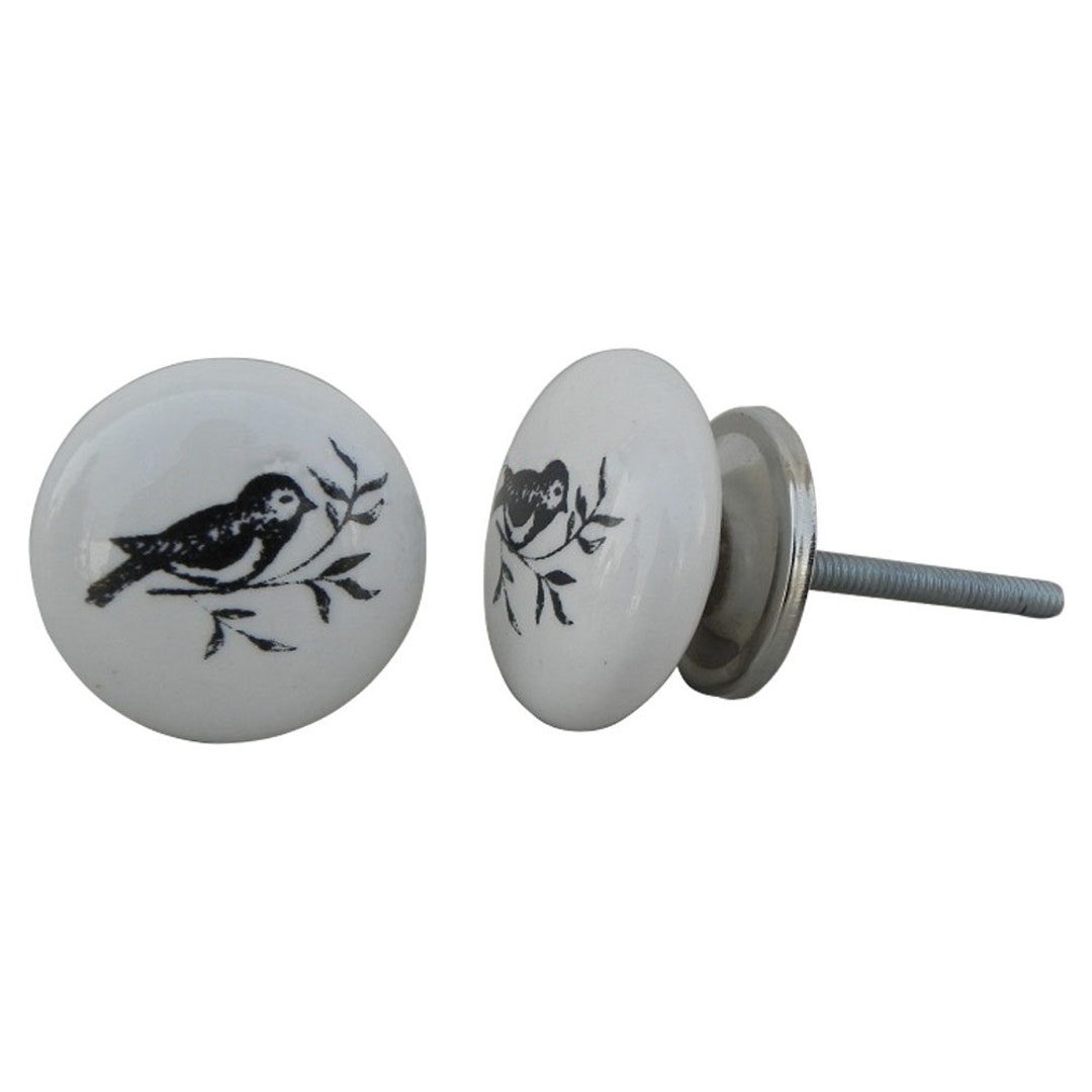 Black and White Cupboard Door Knob Decorated With a Bird on a Branch ...