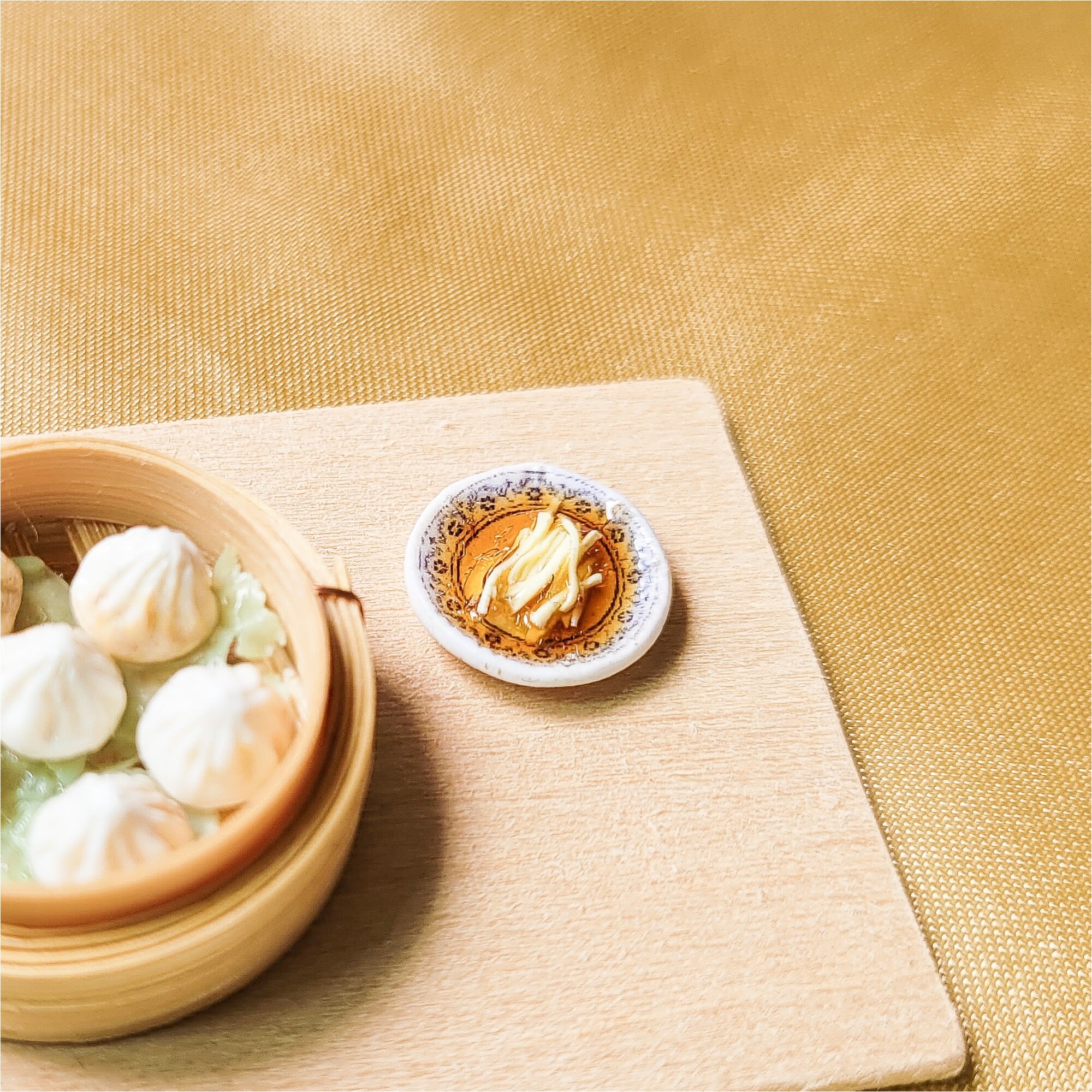 Miniature Xiao Long Bao With a Plate of Ginger Strips in Vinegar (can ...