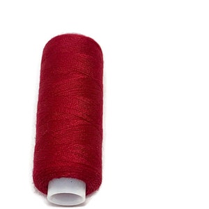 Red Thread. Sew All Polyester Thread Spool. Red 100% Polyester Thread ...