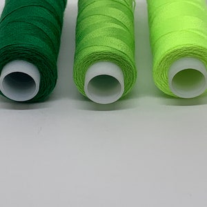 Green Thread. Sew All Polyester Thread Spool. Lime Green 100% Polyester ...