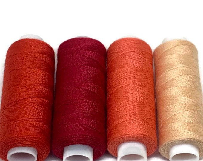 Red Thread. Sew All Polyester Thread Spool. Red 100% Polyester Thread ...
