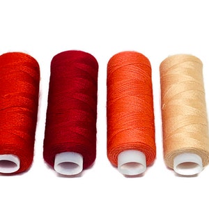 Red Thread. Sew All Polyester Thread Spool. Red 100% Polyester Thread ...