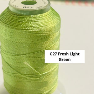 Green Embroidery Thread Spool. 40 Weight. 100 % Polyester. Lime Green ...