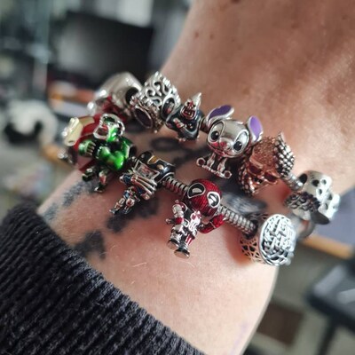 2024 New Two-tone Spinning Wheels Bicycle Dangle Charm,minimalist Charm ...