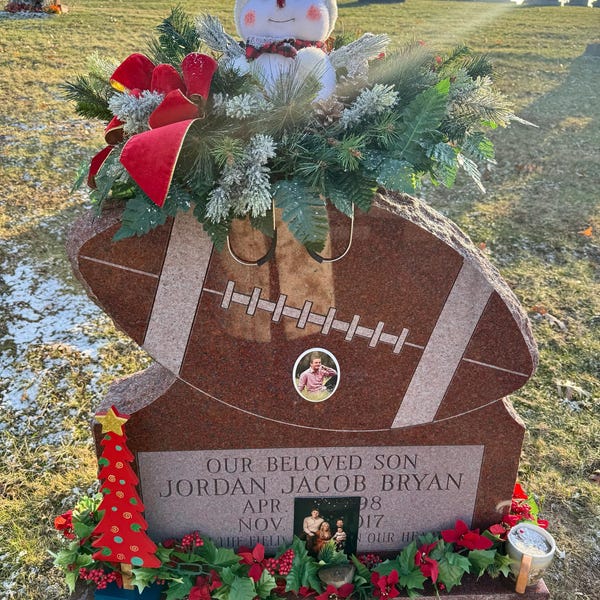 This Chubby Snowman Christmas Cemetery Saddle Has Greenery and a Red ...