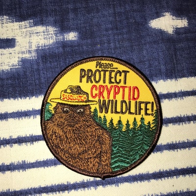 Cryptid PSA Patch Cryptozoology Tracking Society Bigfoot Sasquatch Badge NPS Smokey the Bear ...