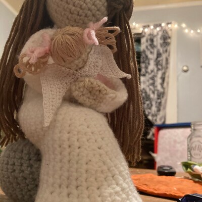 Crochet Pattern little Sparrow Zion Asher. Mother Sitting on a Rock ...